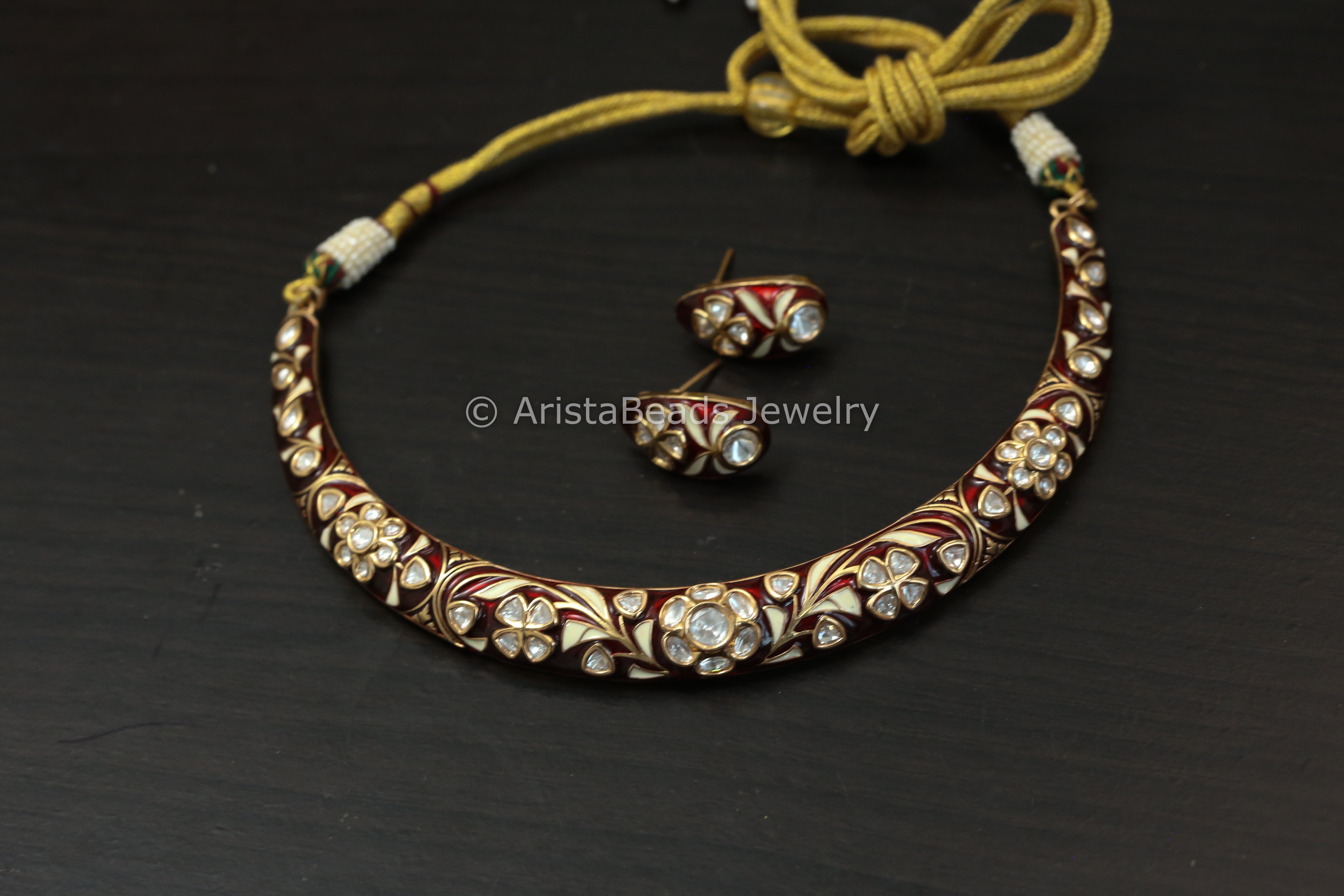 Premium Meenakari Uncut Kundan Hasli Set - Red Enamel – AristaJoules